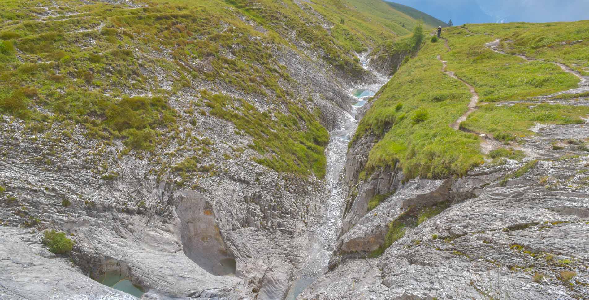 Gletschermühlen Alp Mora, Trin Wandern | WegWandern.ch